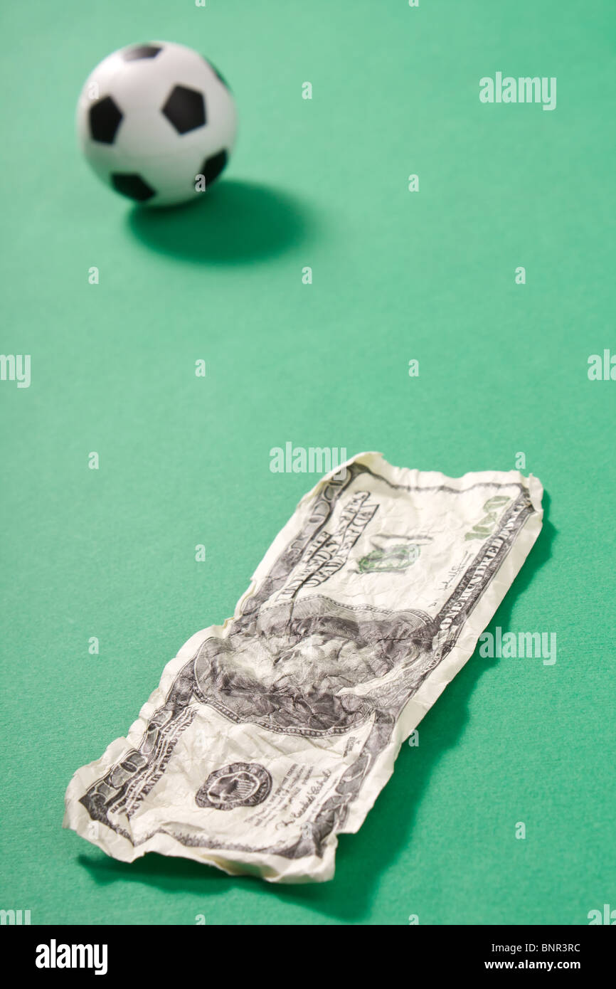 football and dollar Stock Photo - Alamy