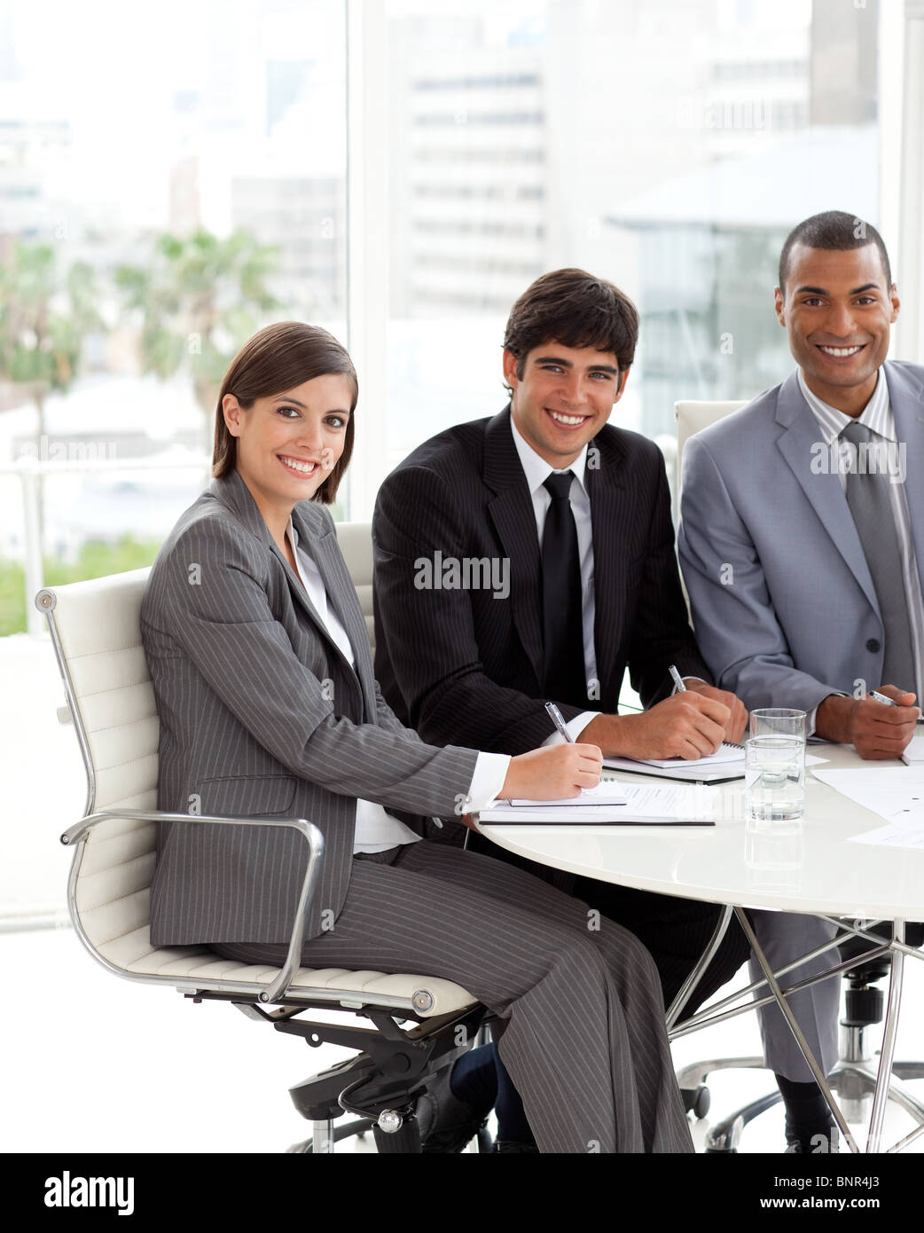 Three co workers at the office hi-res stock photography and images - Alamy