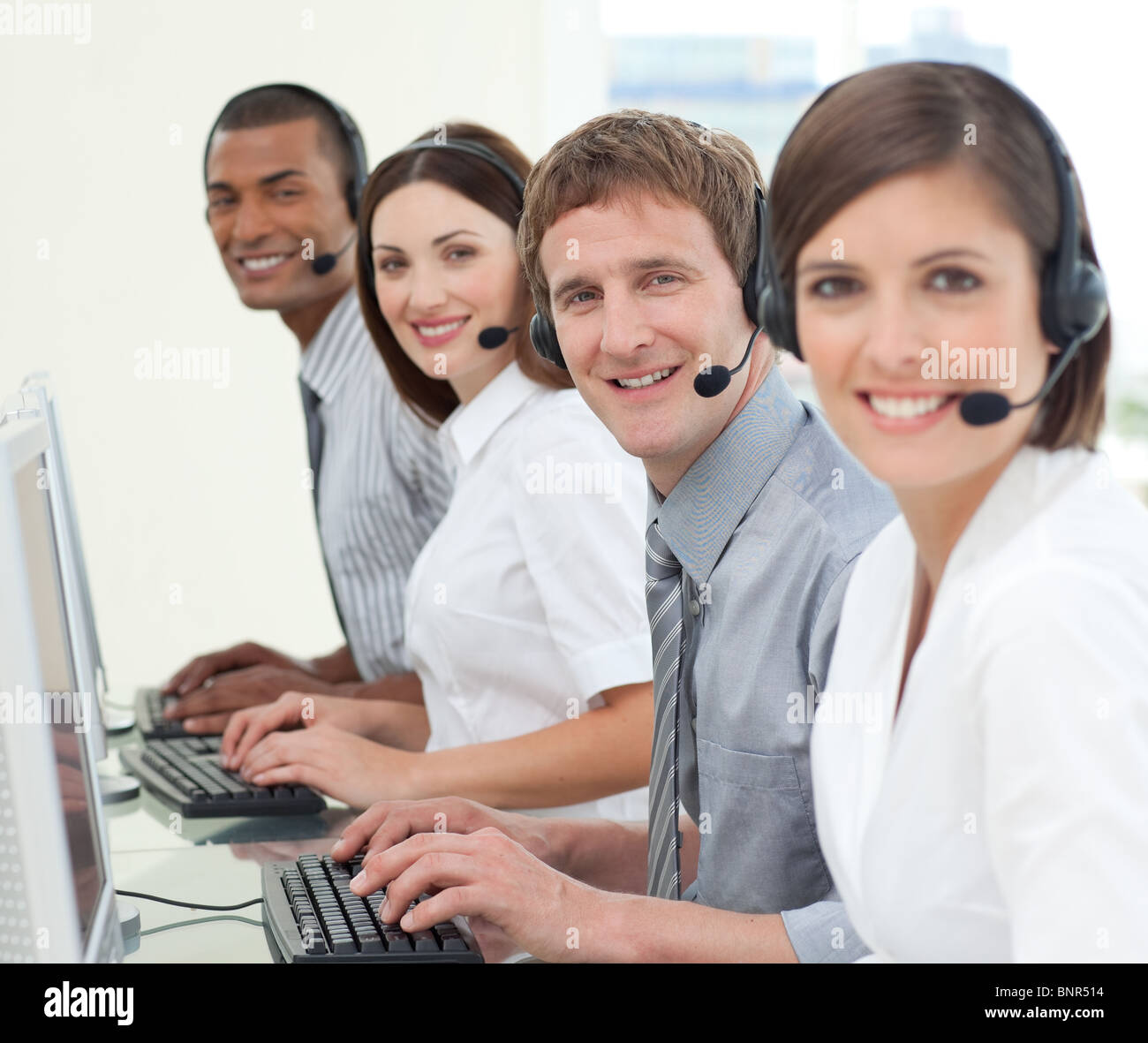Business people with headset on Stock Photo - Alamy