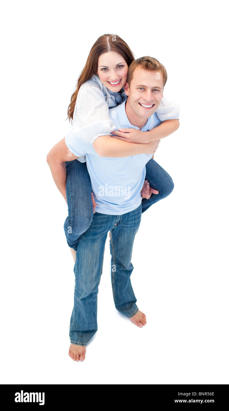Enamoured couple enjoying piggyback ride Stock Photo - Alamy