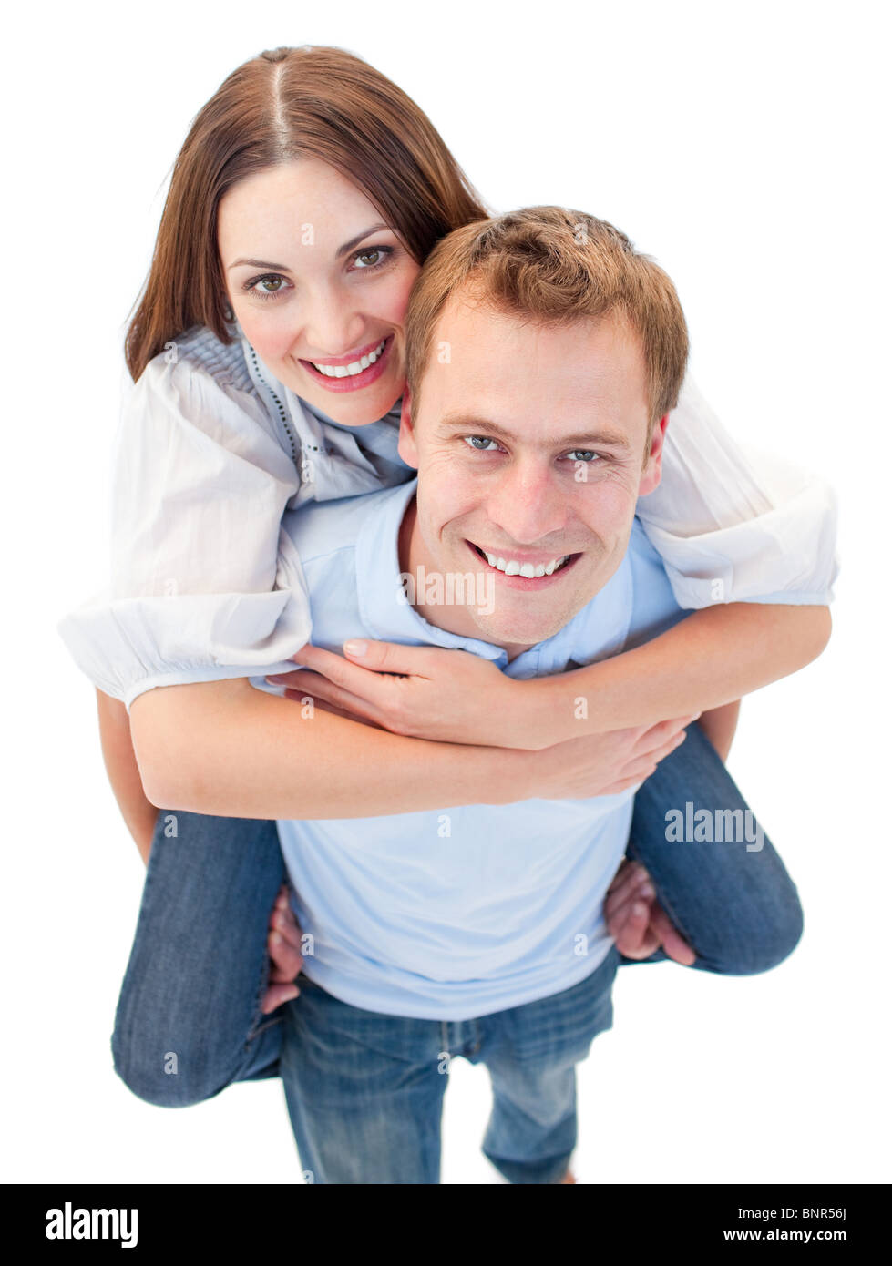 Enamoured couple enjoying piggyback ride Stock Photo - Alamy