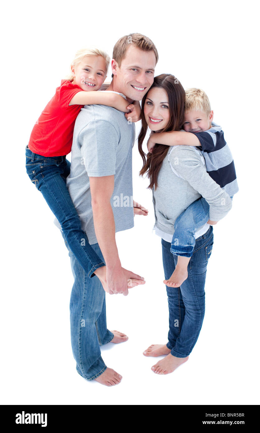 Smiling Family Against A White Background Stock Photo - Alamy