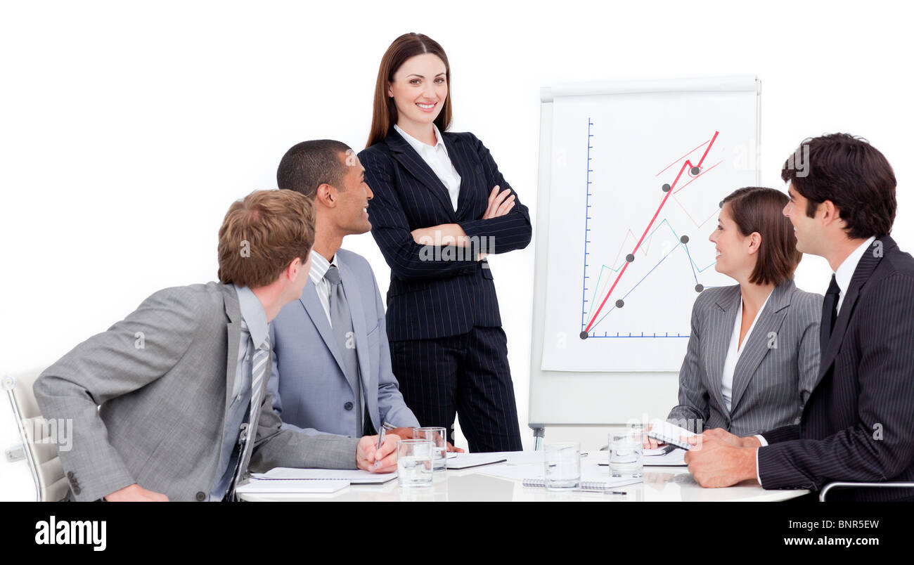 Smiling businesswoman giving a presentation Stock Photo - Alamy