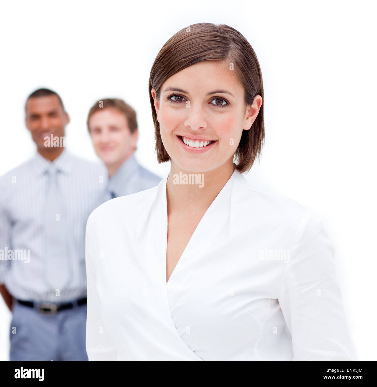 Female manager in front of her team Stock Photo - Alamy