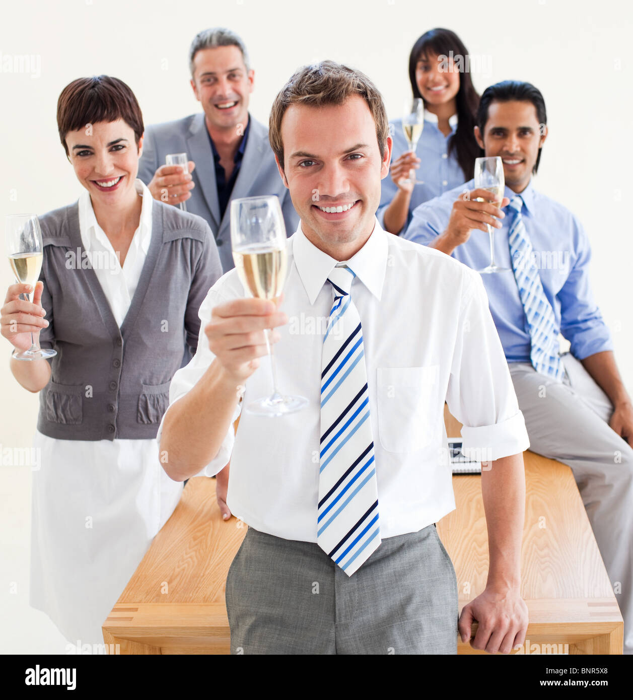 International business people toasting with Champagne Stock Photo - Alamy