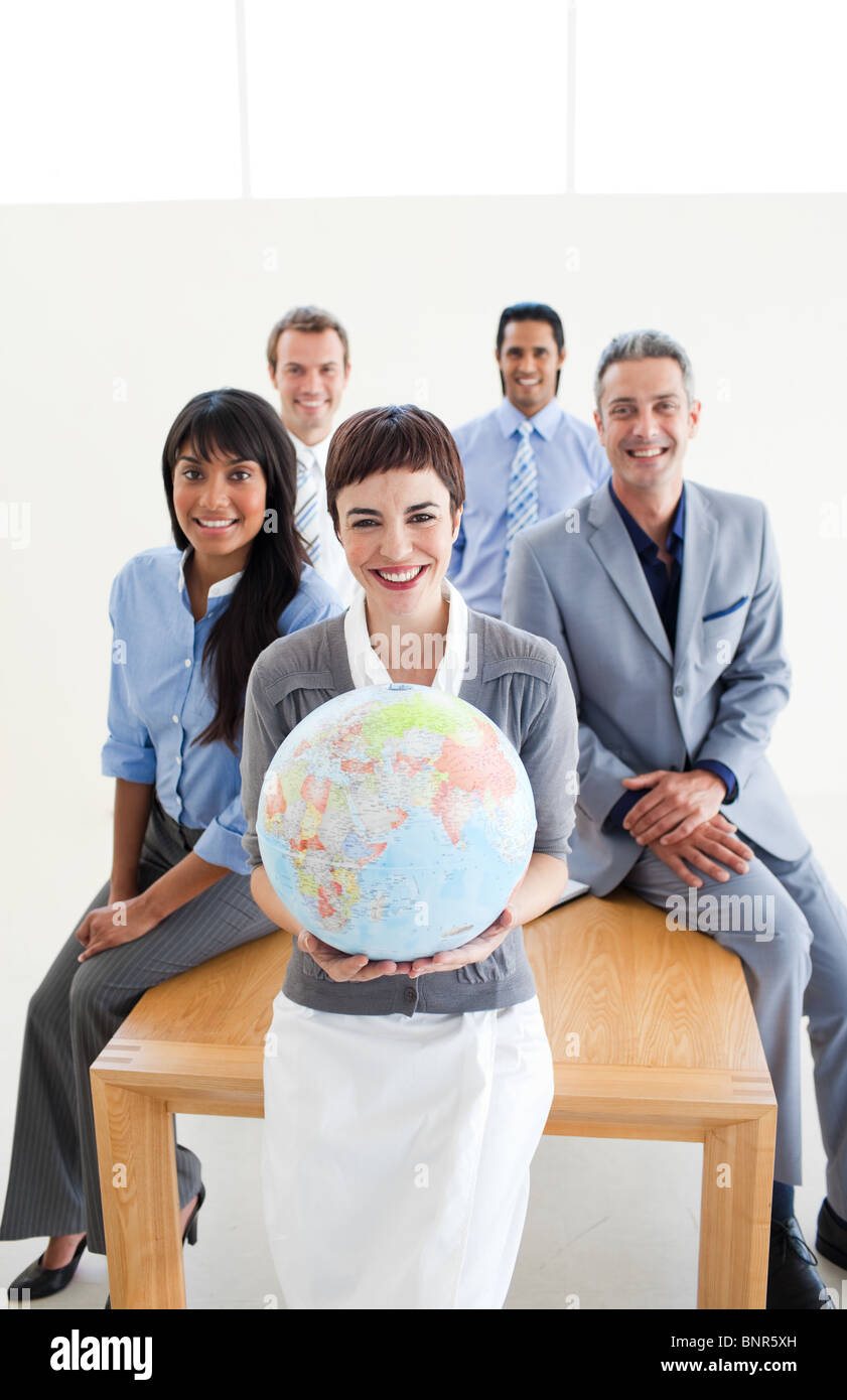 International business team holding terrestrial hi-res stock ...