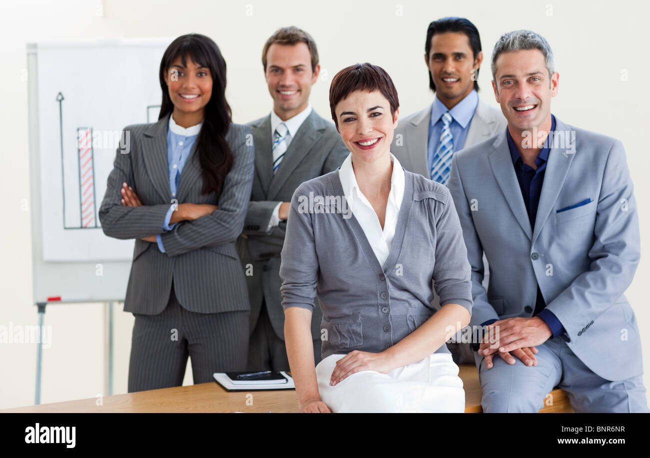 Cheerful business people around a conference table Stock Photo - Alamy