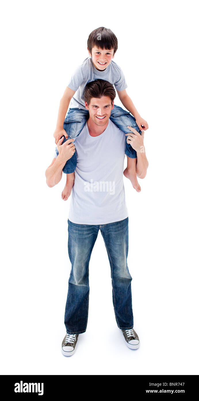 Attractive father giving his son piggyback ride Stock Photo - Alamy