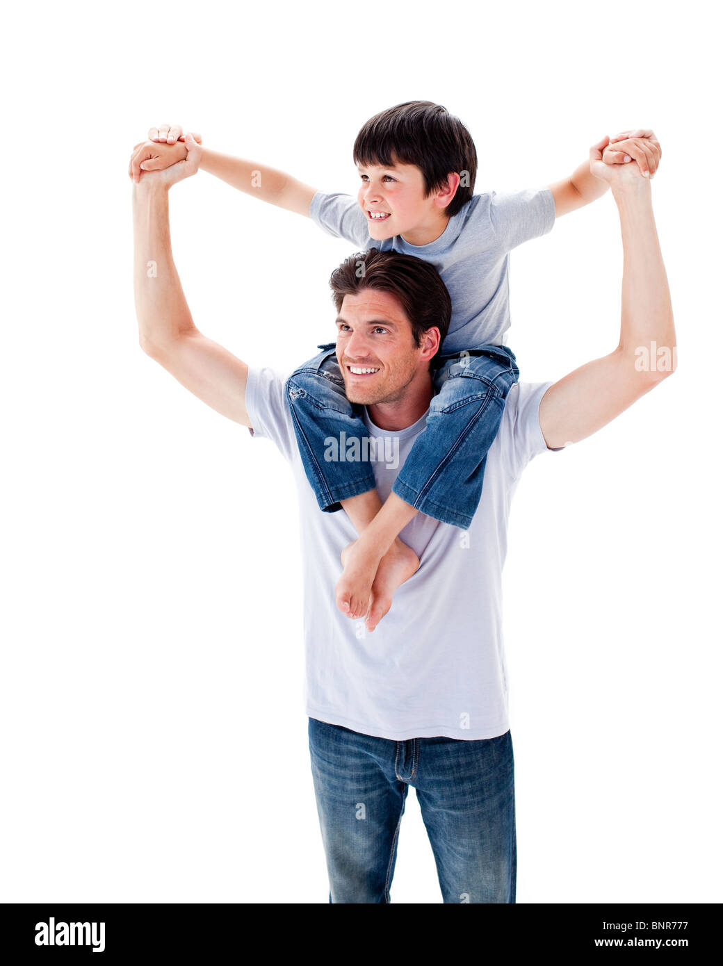 Charming father giving his son piggyback ride Stock Photo - Alamy