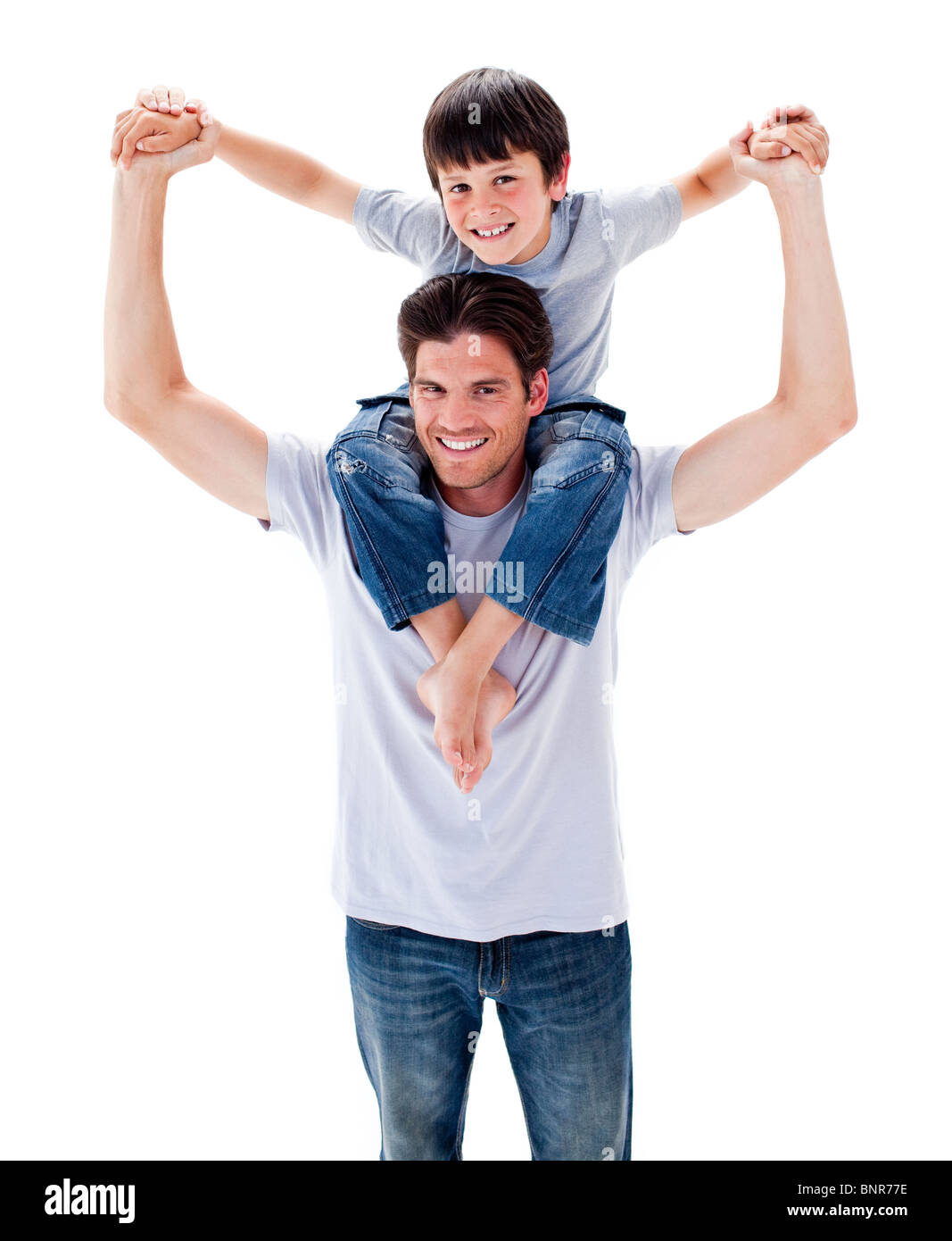 Positive father giving his son piggyback ride Stock Photo - Alamy