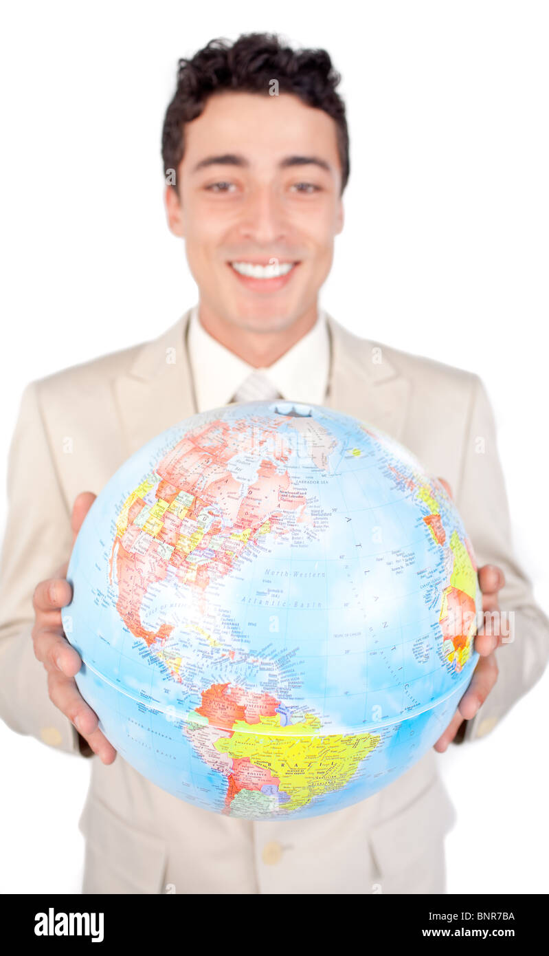 Assertive male executive holding a terrestrial globe Stock Photo - Alamy