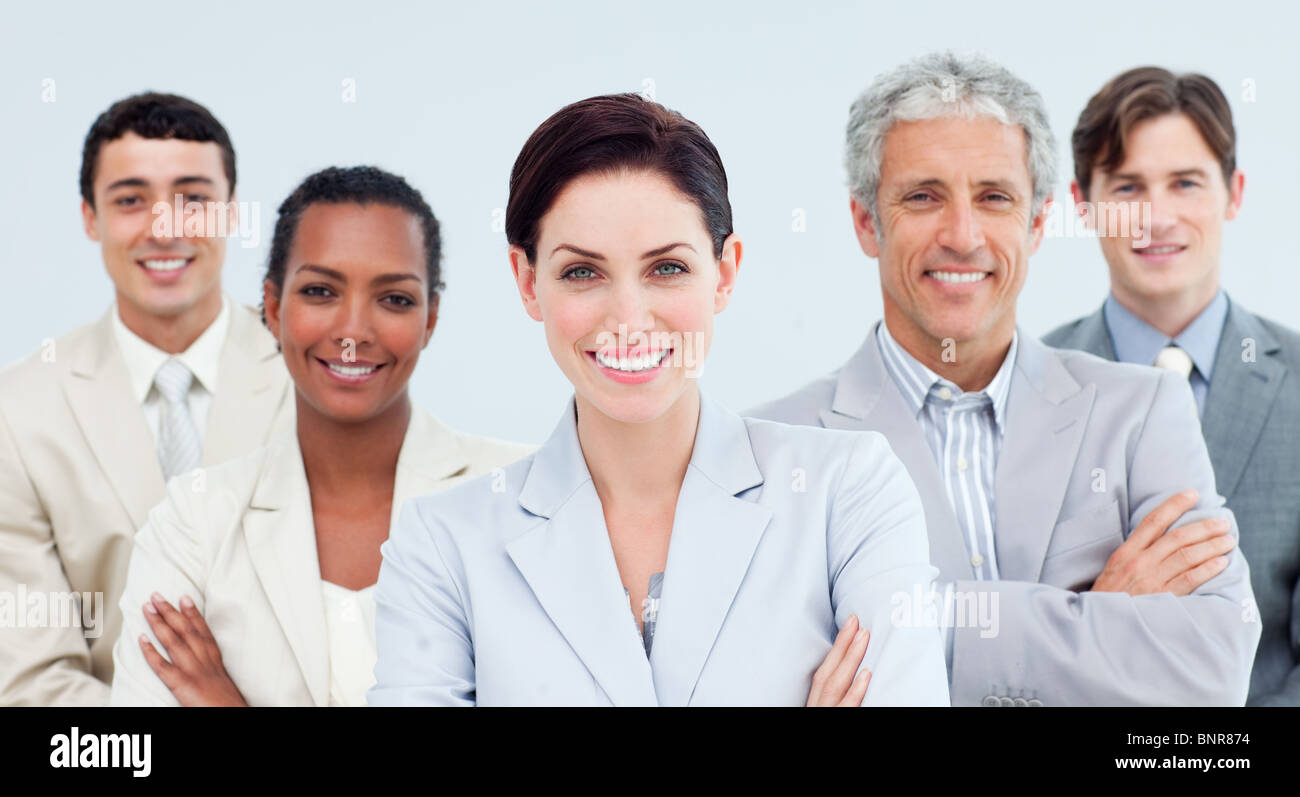 International business people standing with folded arms Stock Photo - Alamy
