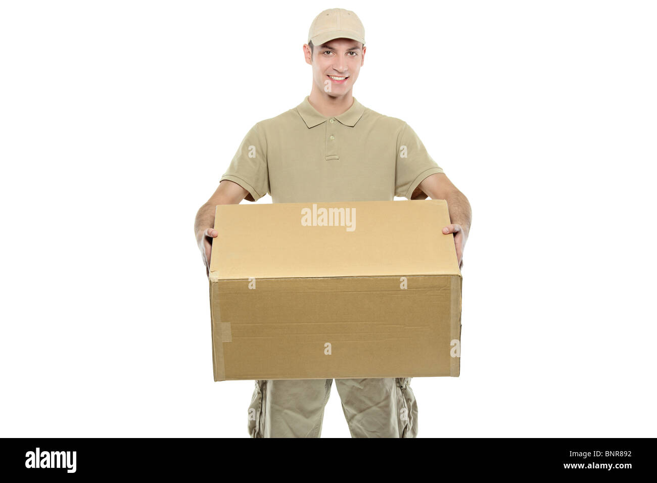 A delivery boy carrying a box Stock Photo - Alamy