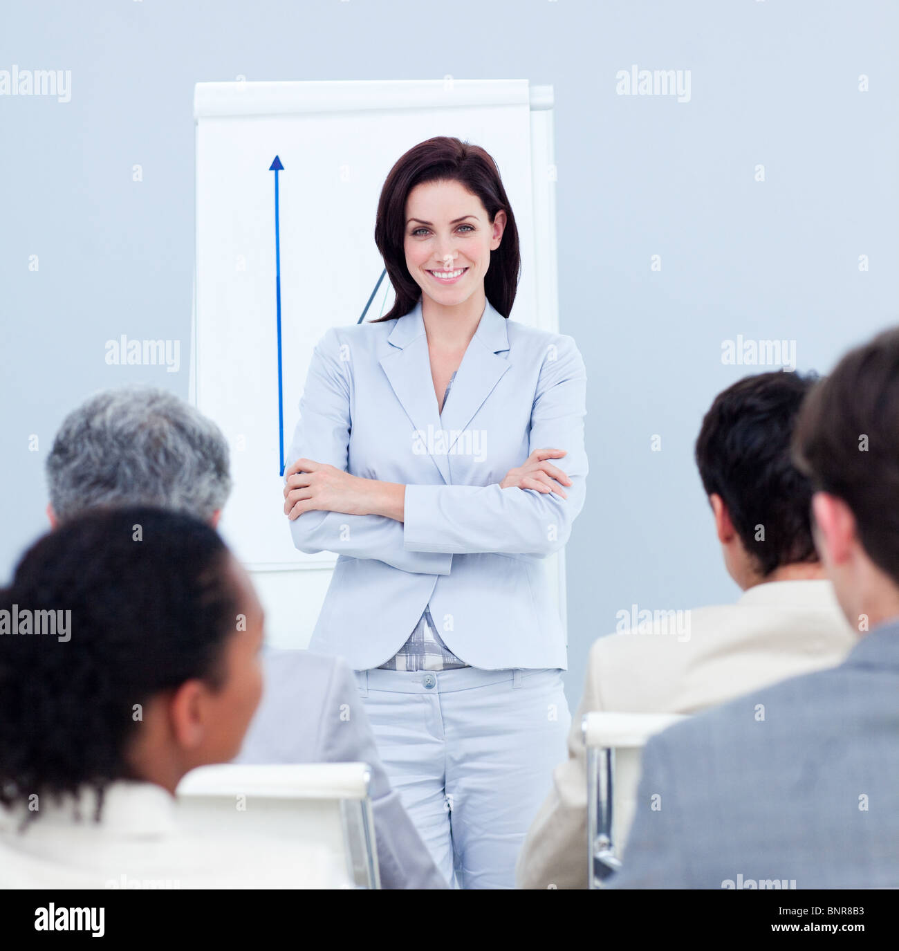 Positive businesswoman doing a presentation Stock Photo - Alamy