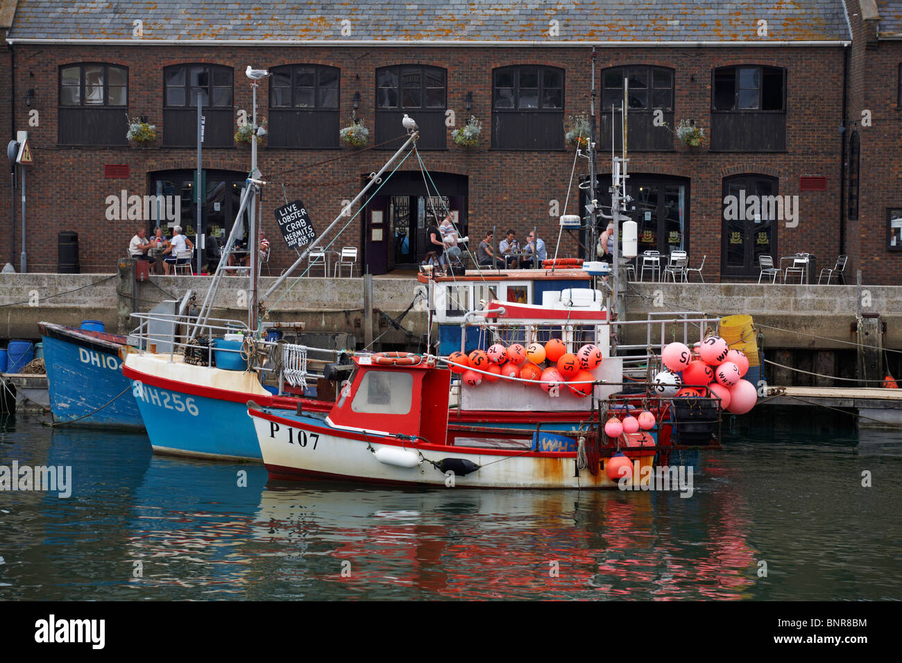 Fishing boats moored at Weymouth Quayside Stock Photo - Alamy