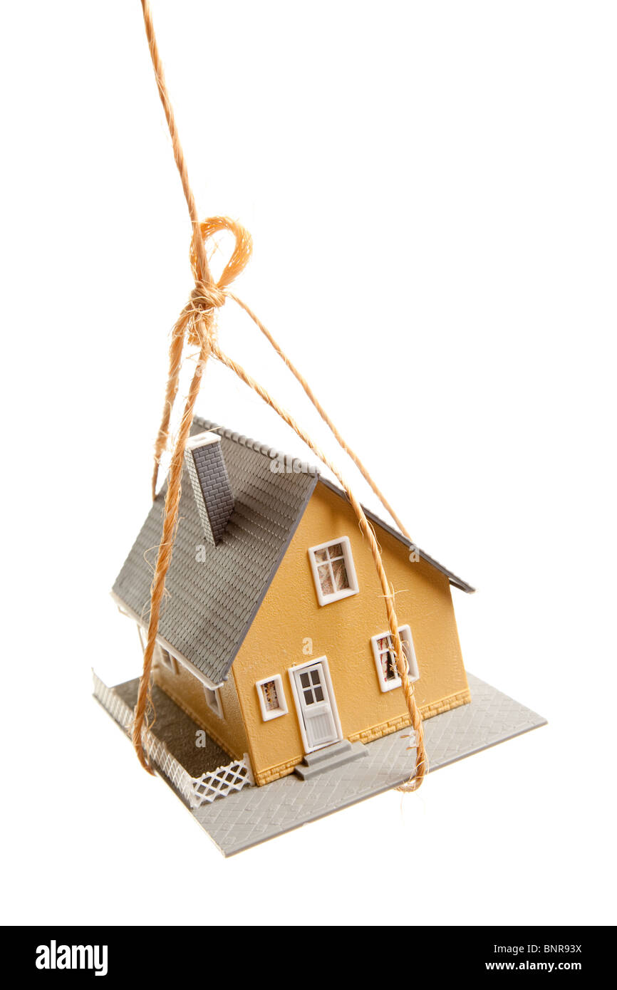 House Hanging by a String Isolated on a White Background Stock Photo ...