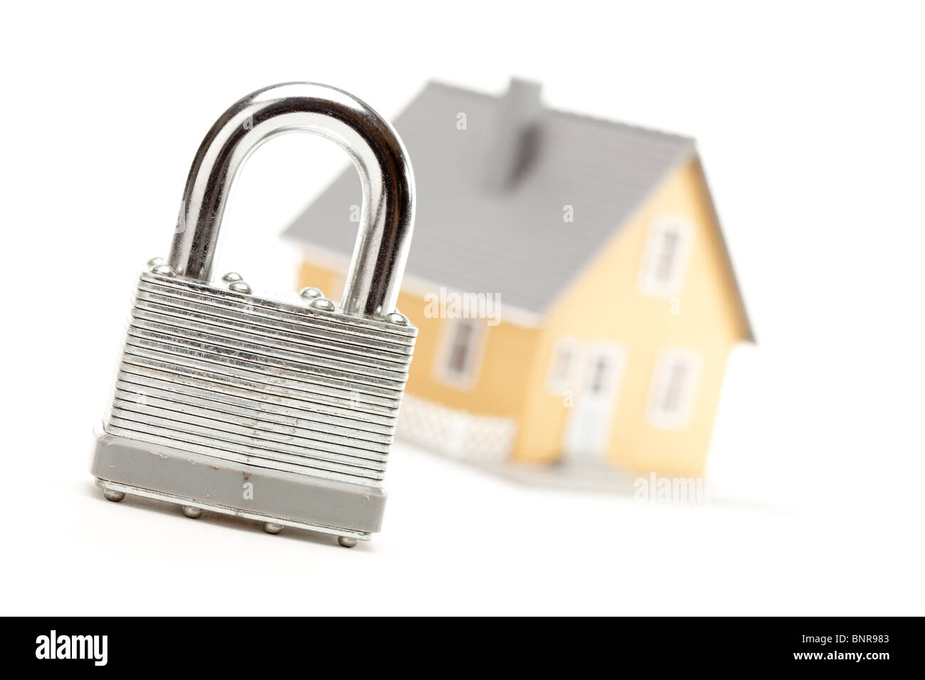 Security concept lock house Cut Out Stock Images & Pictures - Alamy