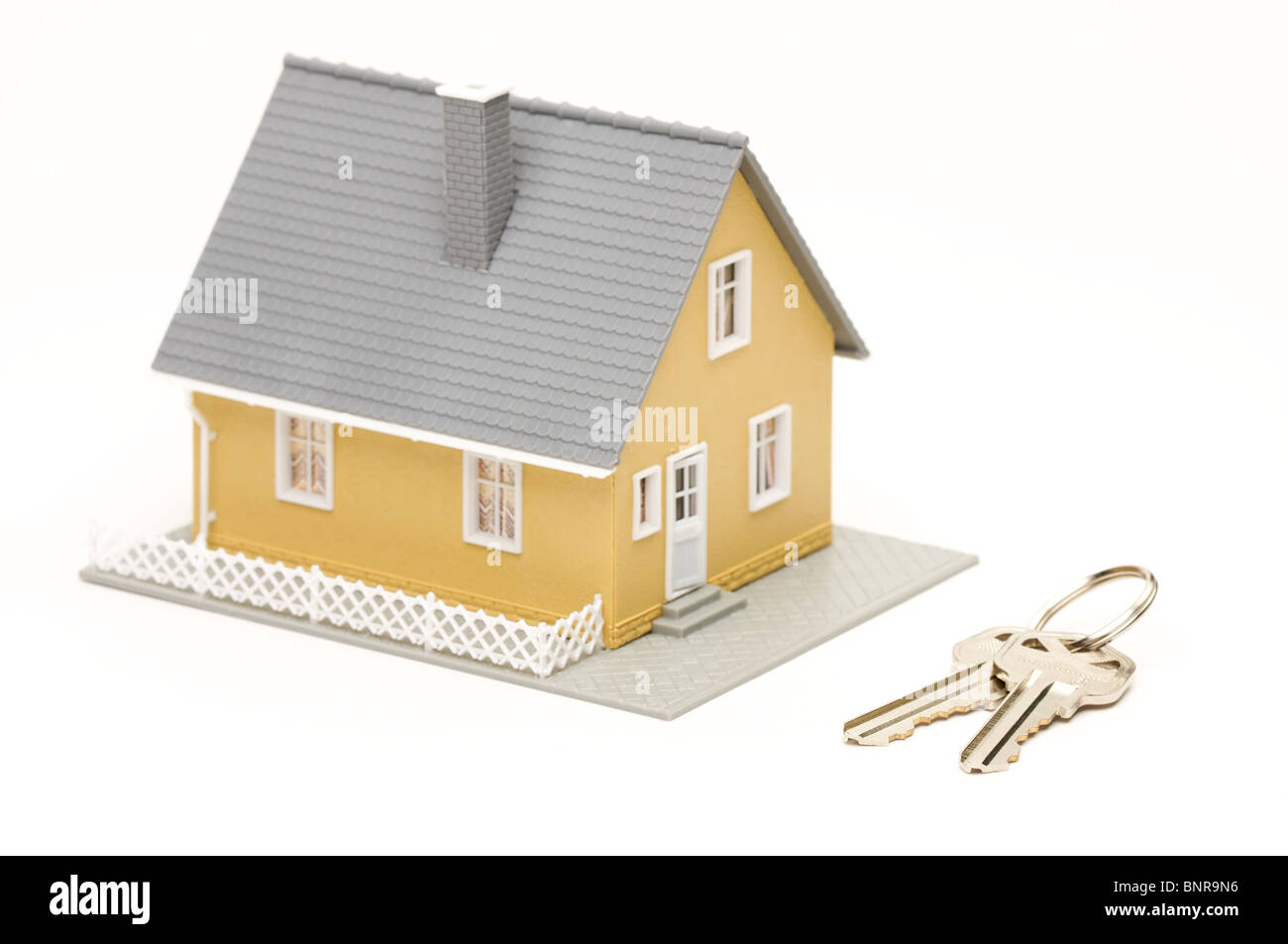 Keys and House isolated on a white background Stock Photo - Alamy