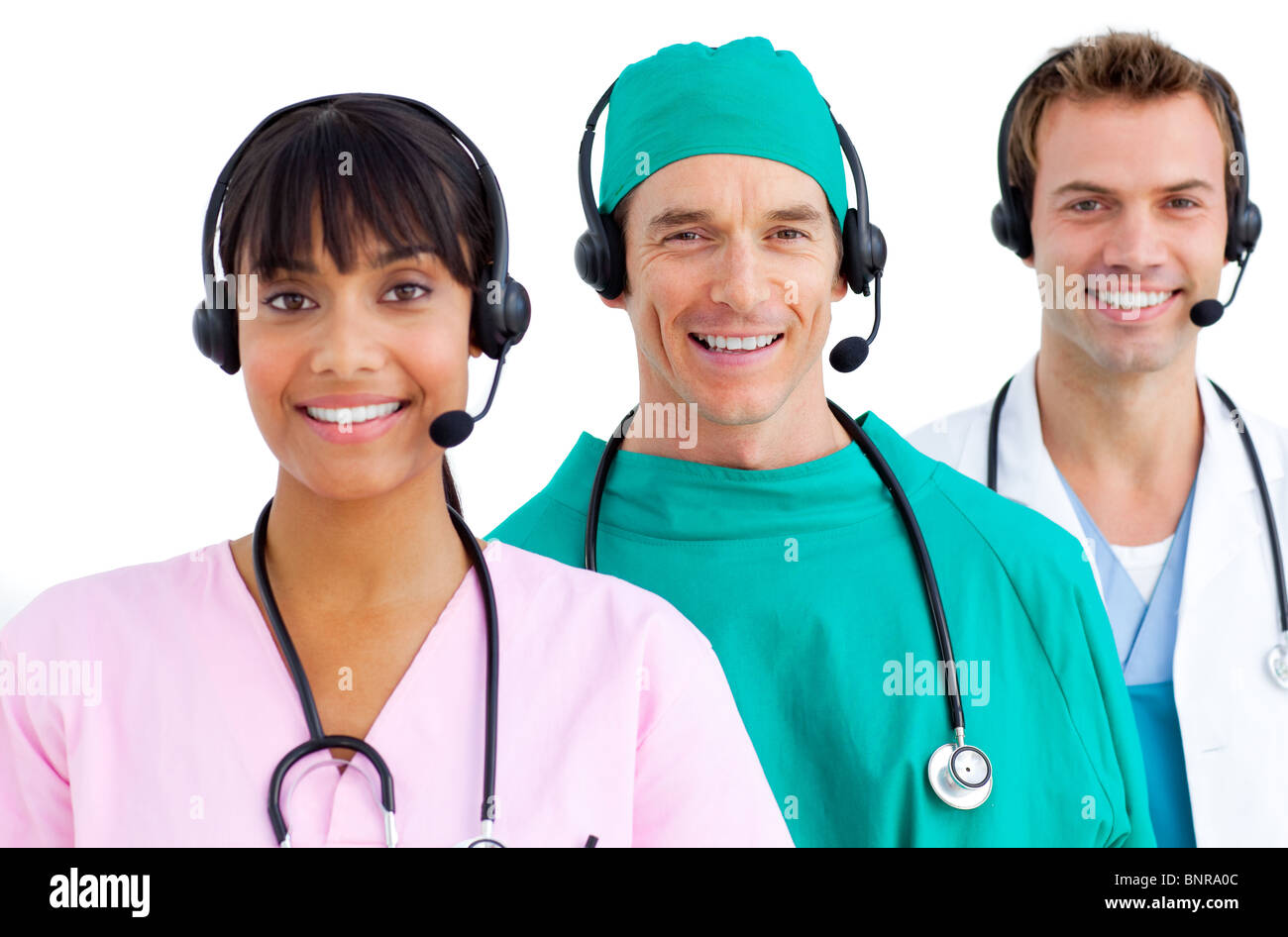 Confident three doctors smiling Stock Photo - Alamy