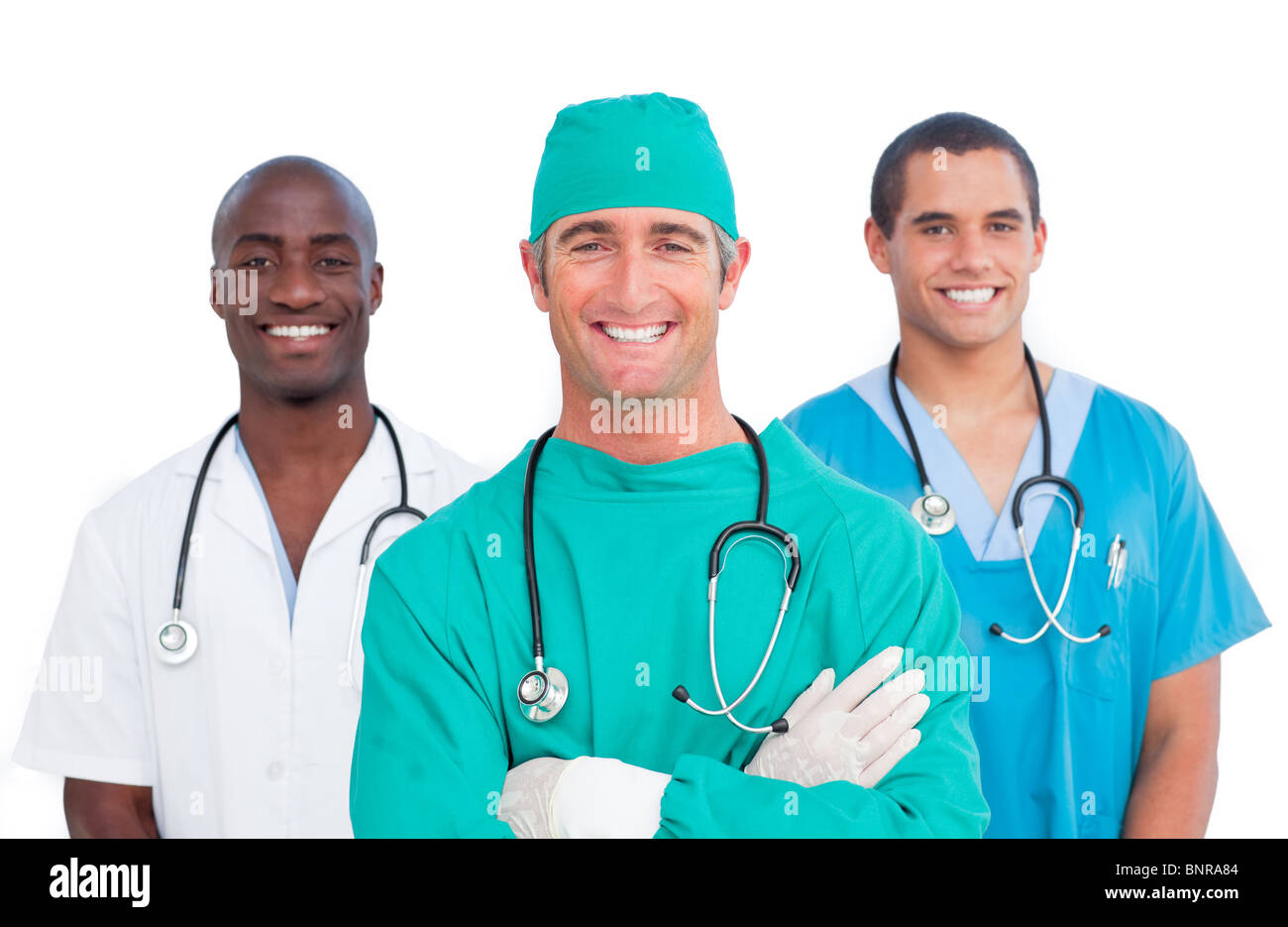 Male surgeon with two male nurses Stock Photo - Alamy