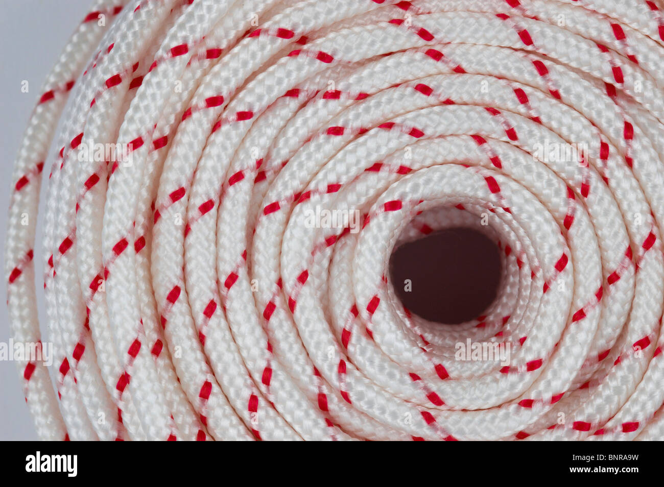 Bundle of white, nylon rope detail Stock Photo - Alamy