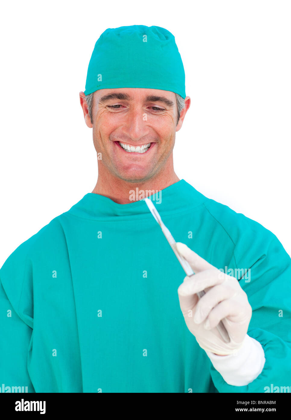 Smiling surgeon holding a scalpel Stock Photo - Alamy