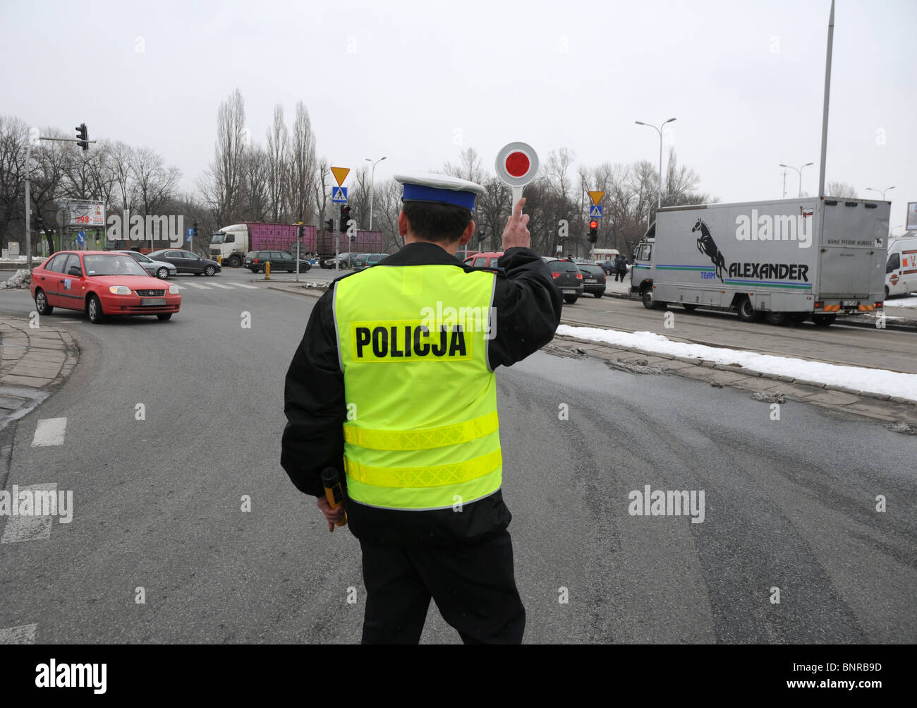 police officer stopping car in Warsaw, Poland Stock Photo - Alamy