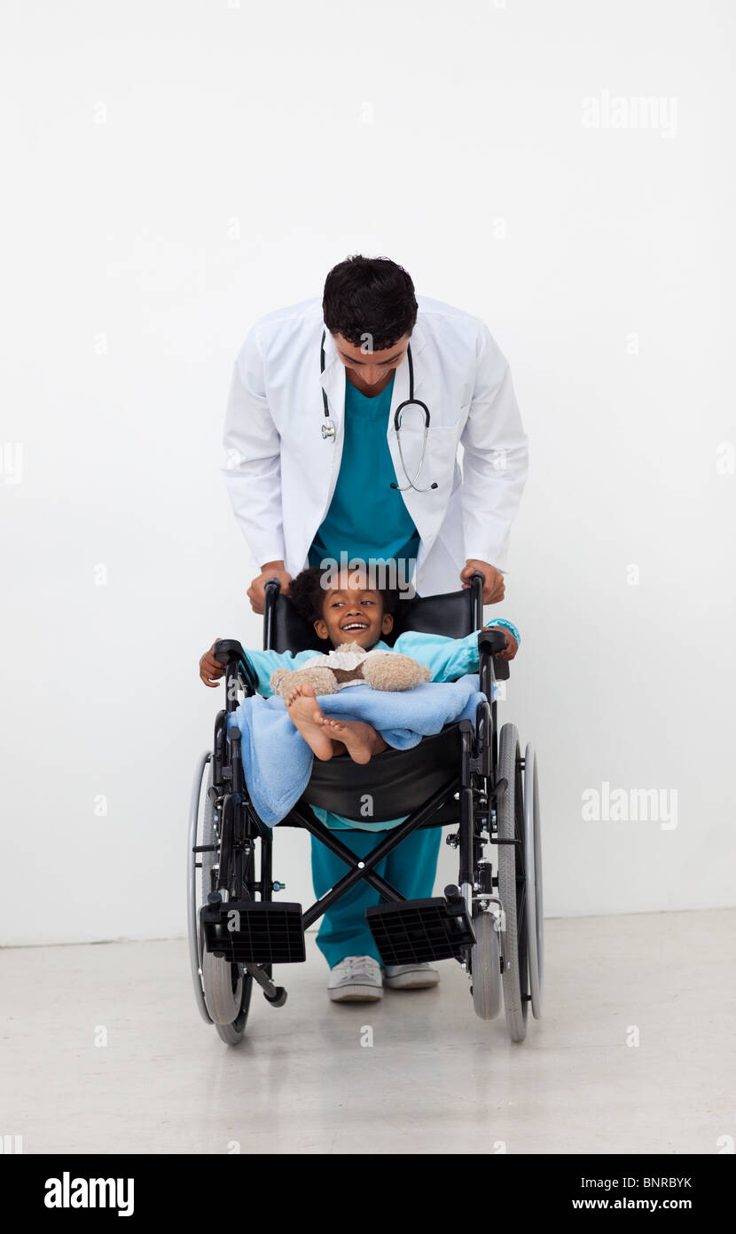 Doctor helping a sick child Stock Photo - Alamy