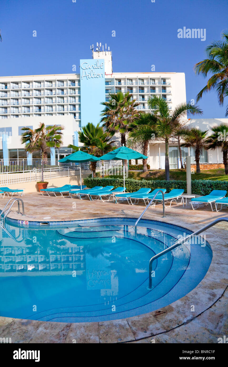 The pool area of the Caribe Hilton resort in San Juan, Puerto Rico ...