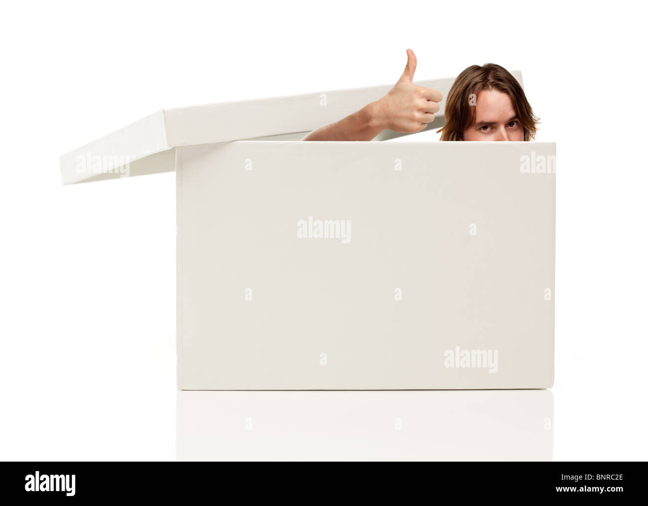 Young Man with Thumbs Up and Popping His Head out from a Blank White ...