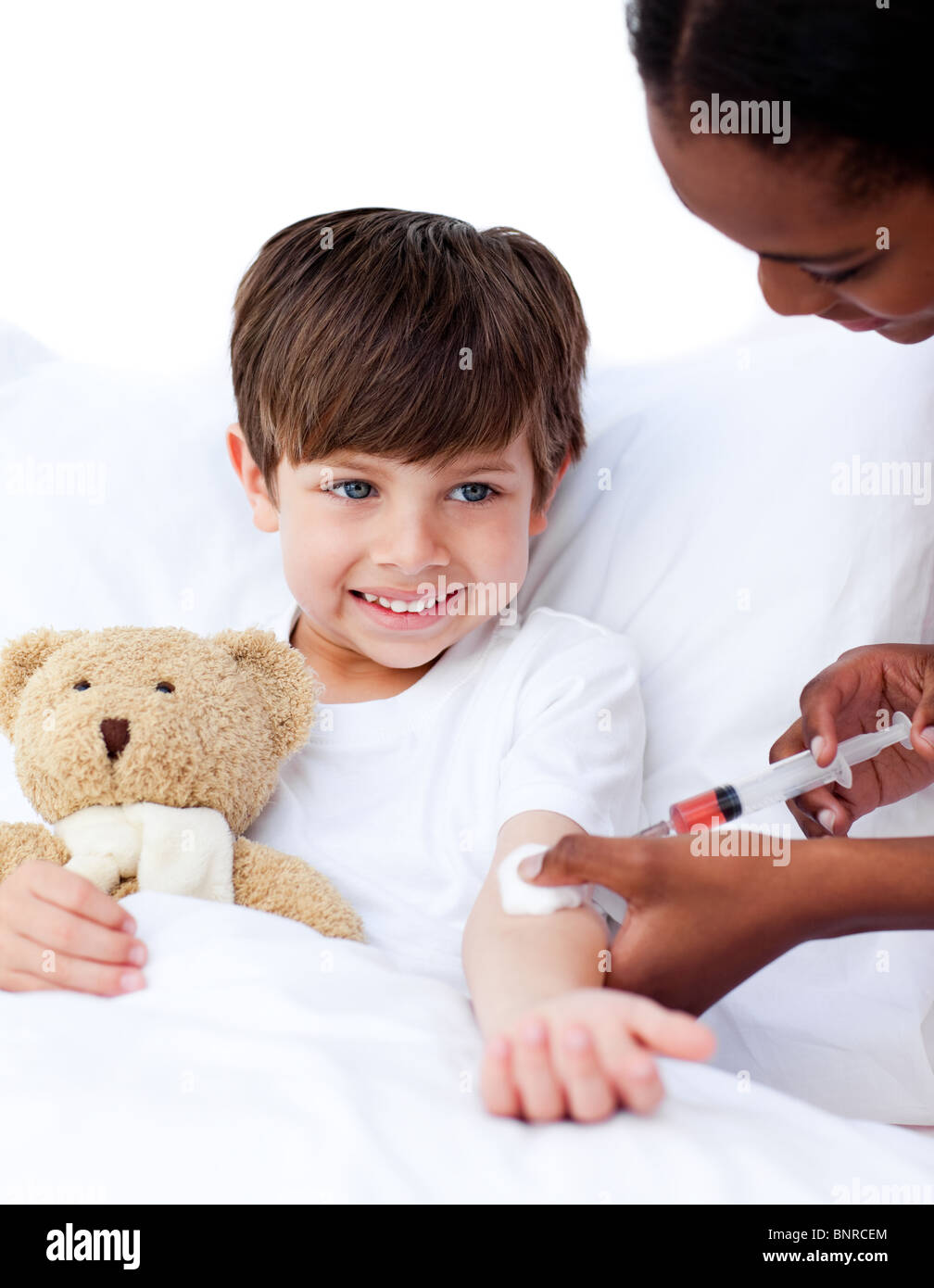 Nurse giving boy injection hi-res stock photography and images - Alamy