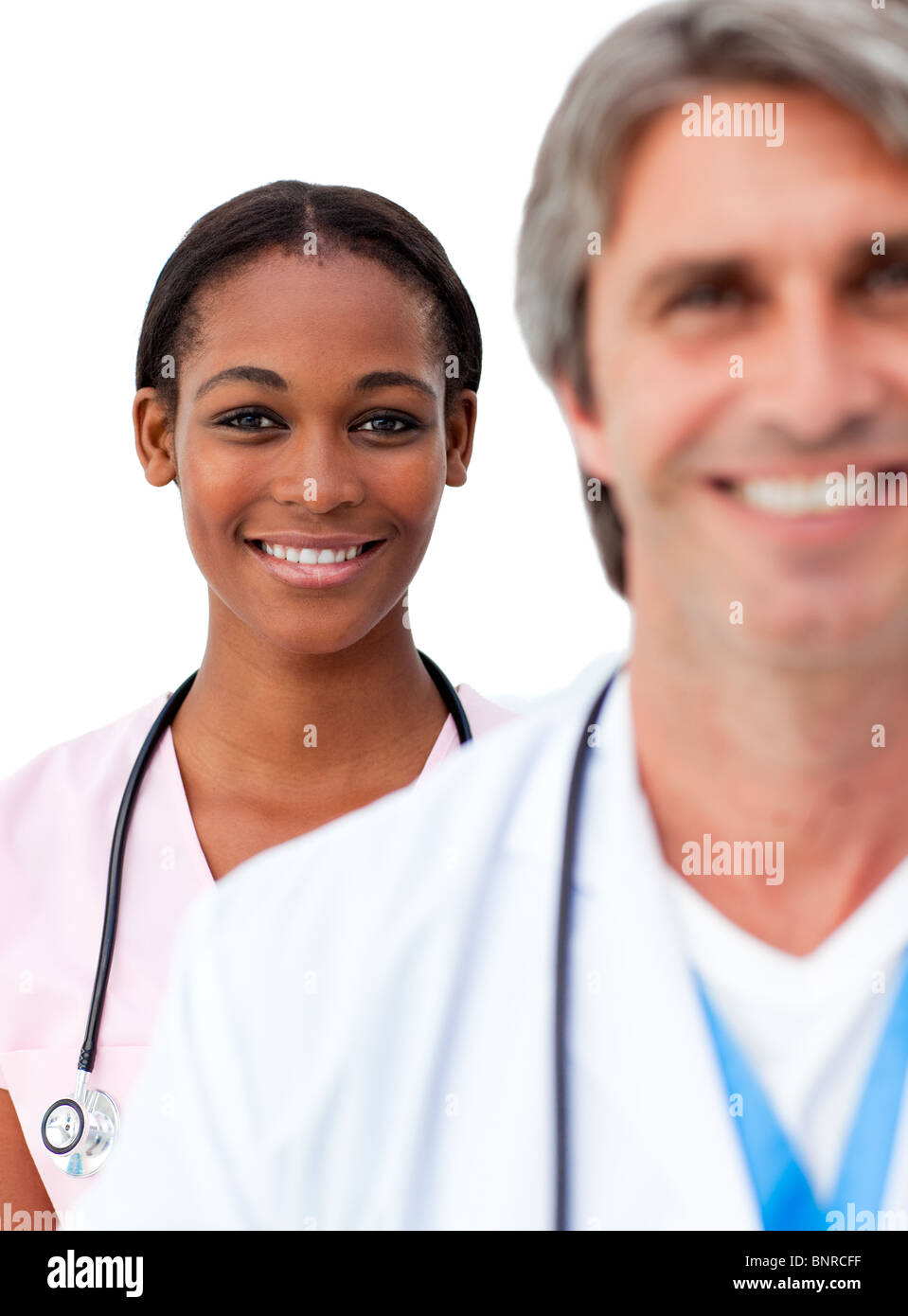 Two doctors standing in a line Stock Photo - Alamy