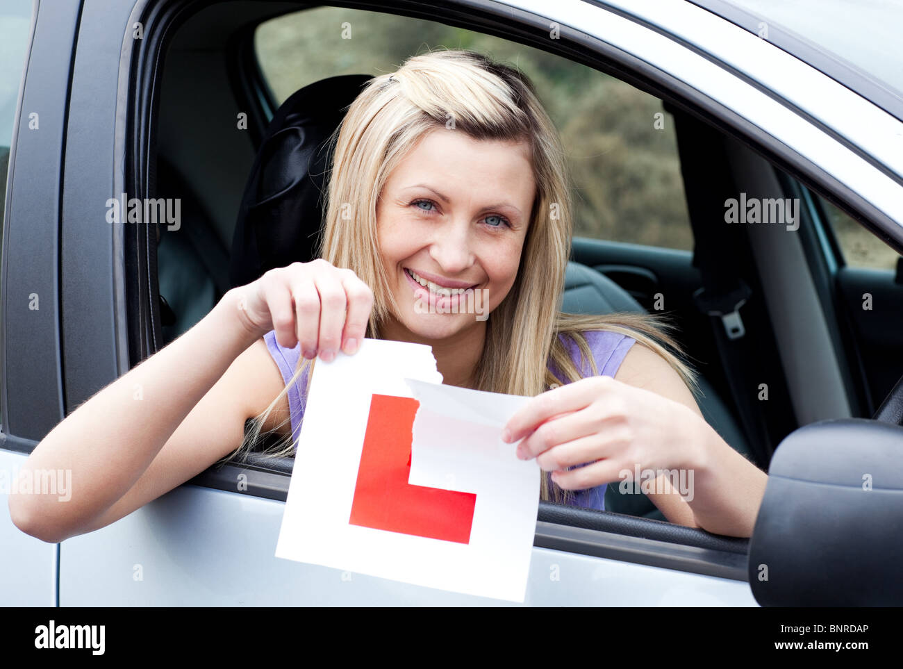Beautiful young woman tearing up hi-res stock photography and images ...