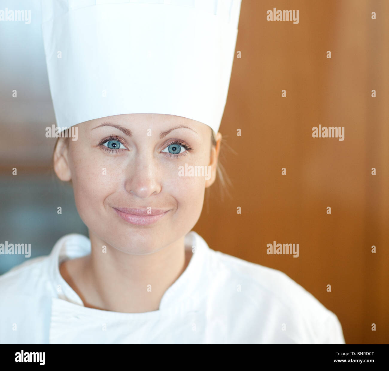 Portrait of a beautiful female chef Stock Photo - Alamy