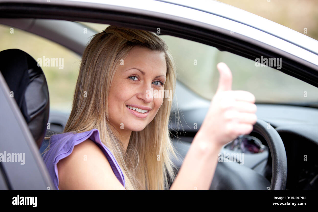 Female driver smiling hi-res stock photography and images - Alamy