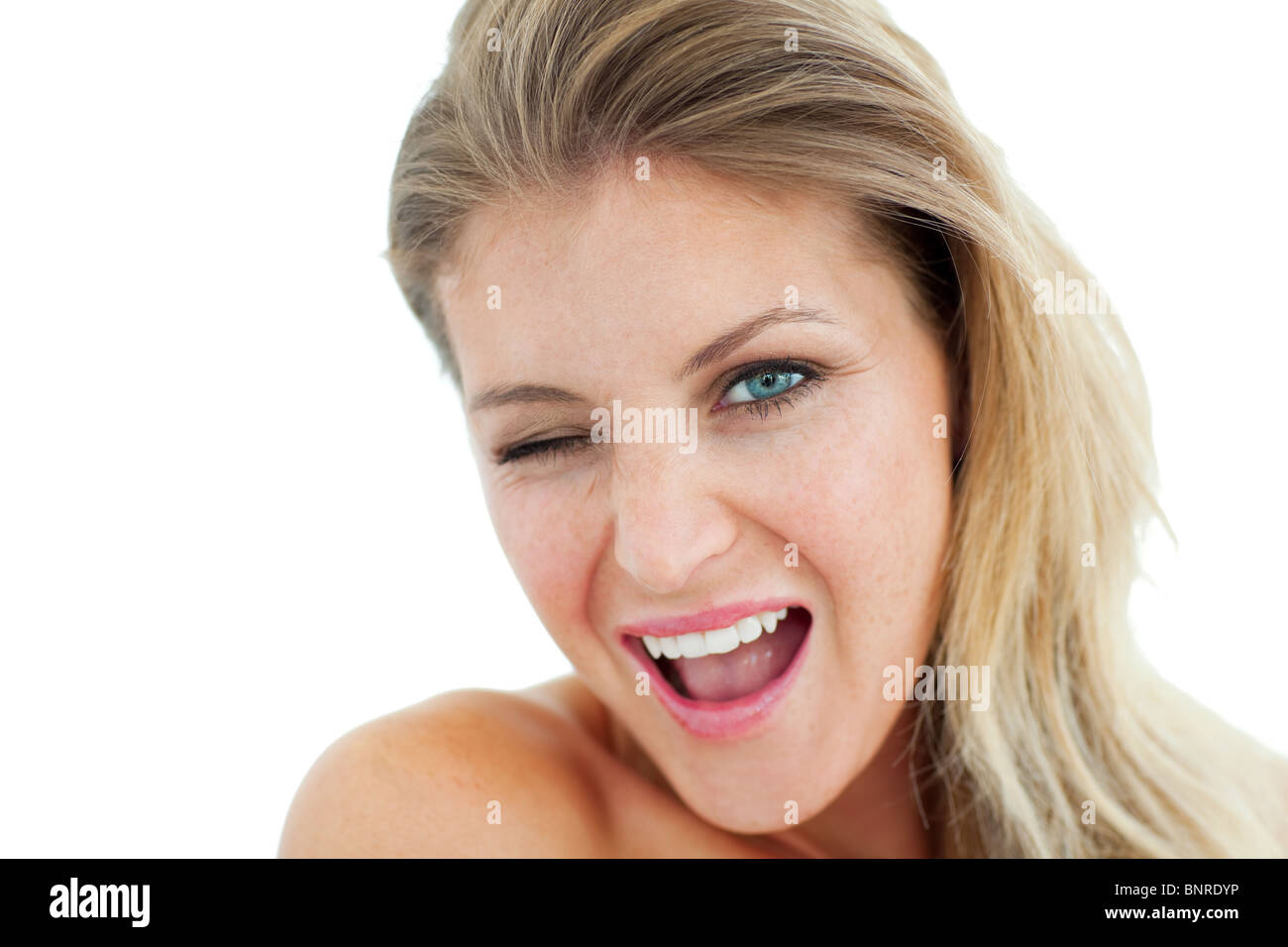 Bright Woman winking Stock Photo - Alamy