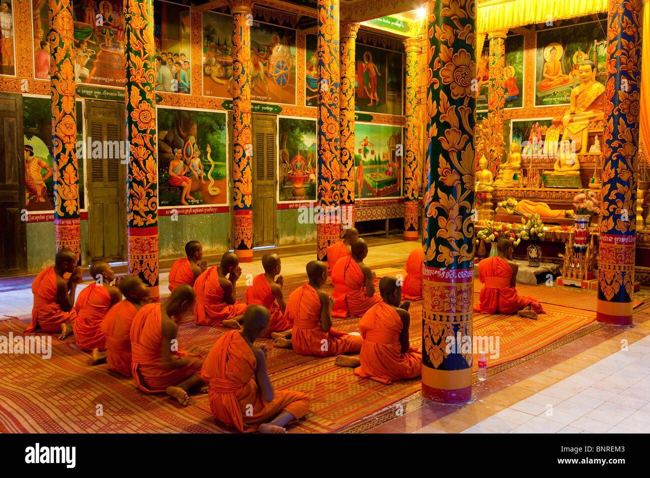 Novice monks chanting evening prayers in a Cambodian pagoda - Kandal ...