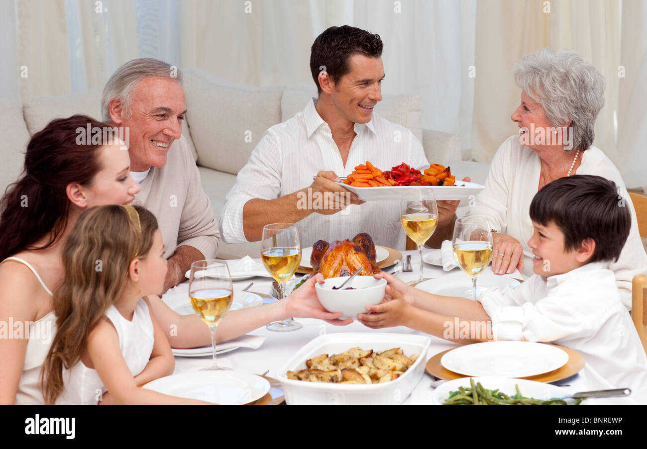 Family having a big dinner at home Stock Photo - Alamy