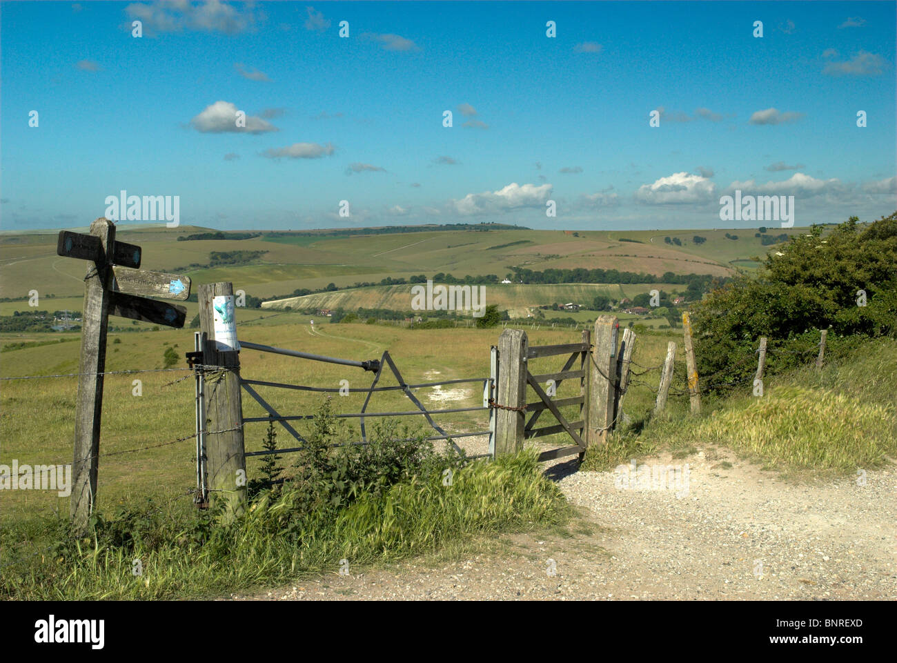 A gate to the South Downs Way leading to the River Adur valley near ...