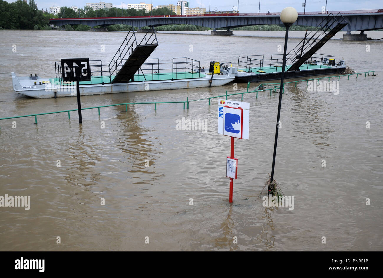 Very high water level of Vistula River and flooded water bus stop in ...