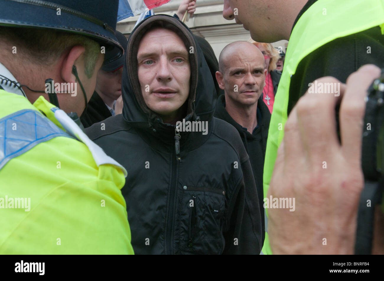 Police talk to hooded male demonstrator about his language at English ...