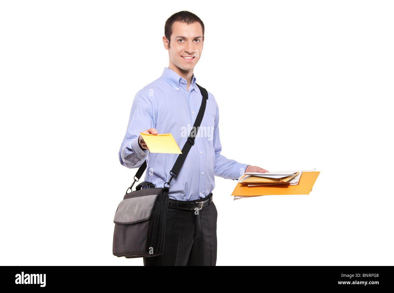 A postman delivering mail Stock Photo - Alamy