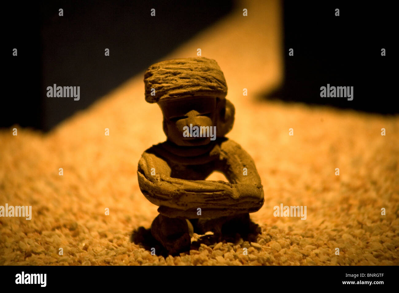 A sculpture is displayed in the museum of the ancient Toltec city of ...