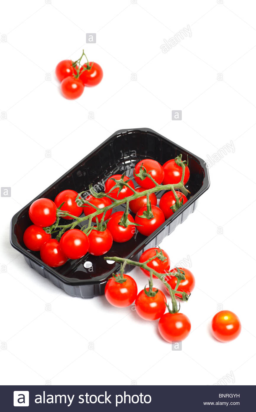 Cherry tomatoes in tray Stock Photo - Alamy