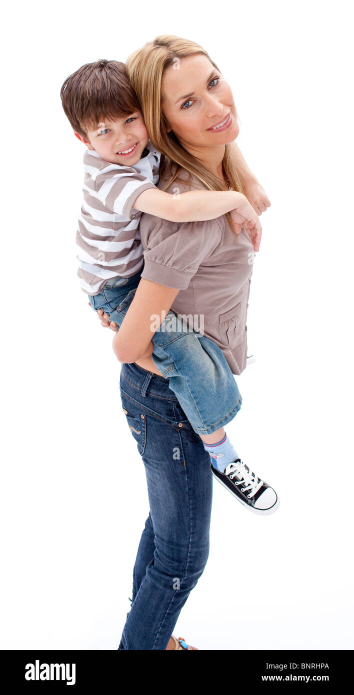 Woman giving son piggyback ride Stock Photo - Alamy