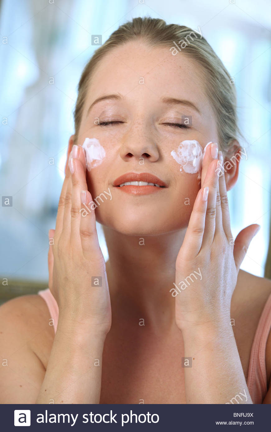 Woman Face Cream Cheeks High Resolution Stock Photography and Images ...
