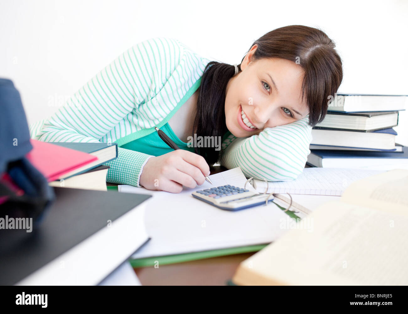 Female white 20s smiling desk books hi-res stock photography and images ...