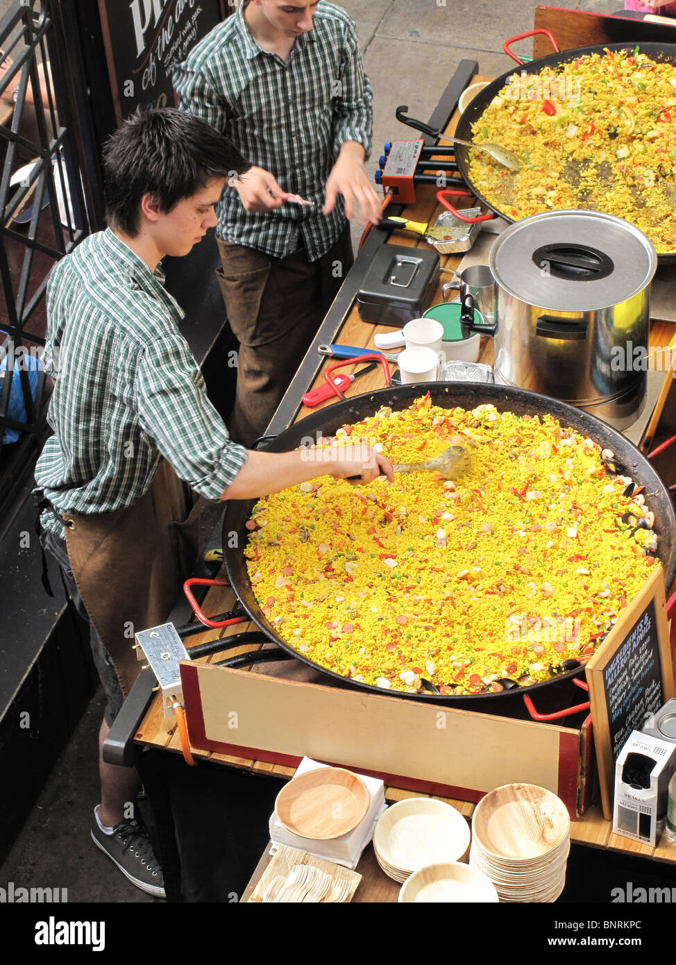 Paella cooking hi-res stock photography and images - Alamy