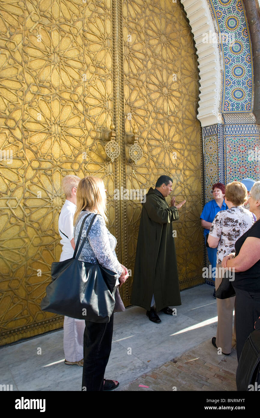 Local guide "Momo" (Mohammed) talking to a tour group outside the Royal ...