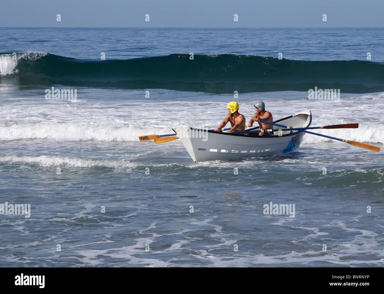 Lifeguard rescue team practice in high surf Stock Photo - Alamy
